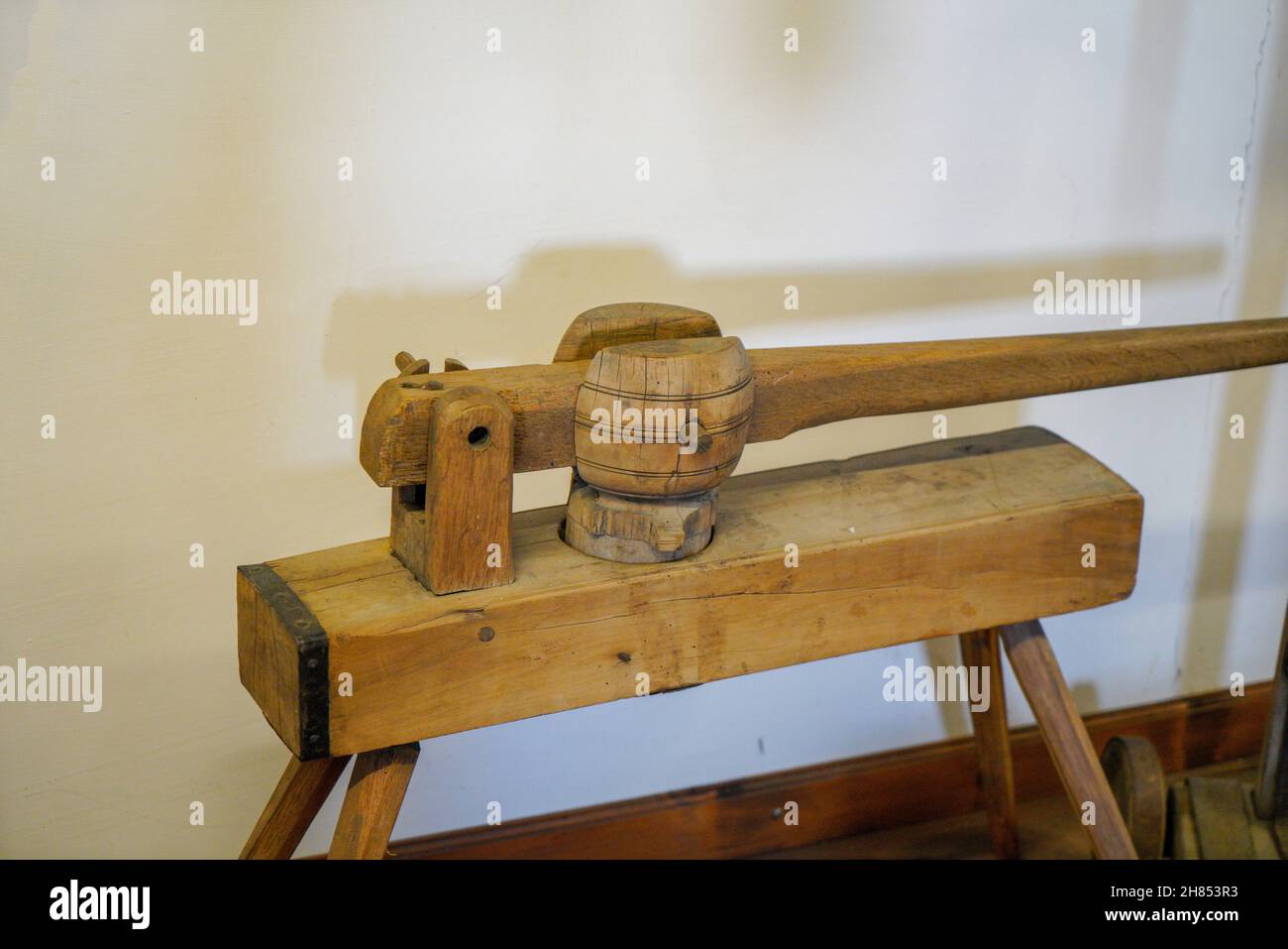 Closeup of a wooden nutcracker tool against the wall Stock Photo - Alamy