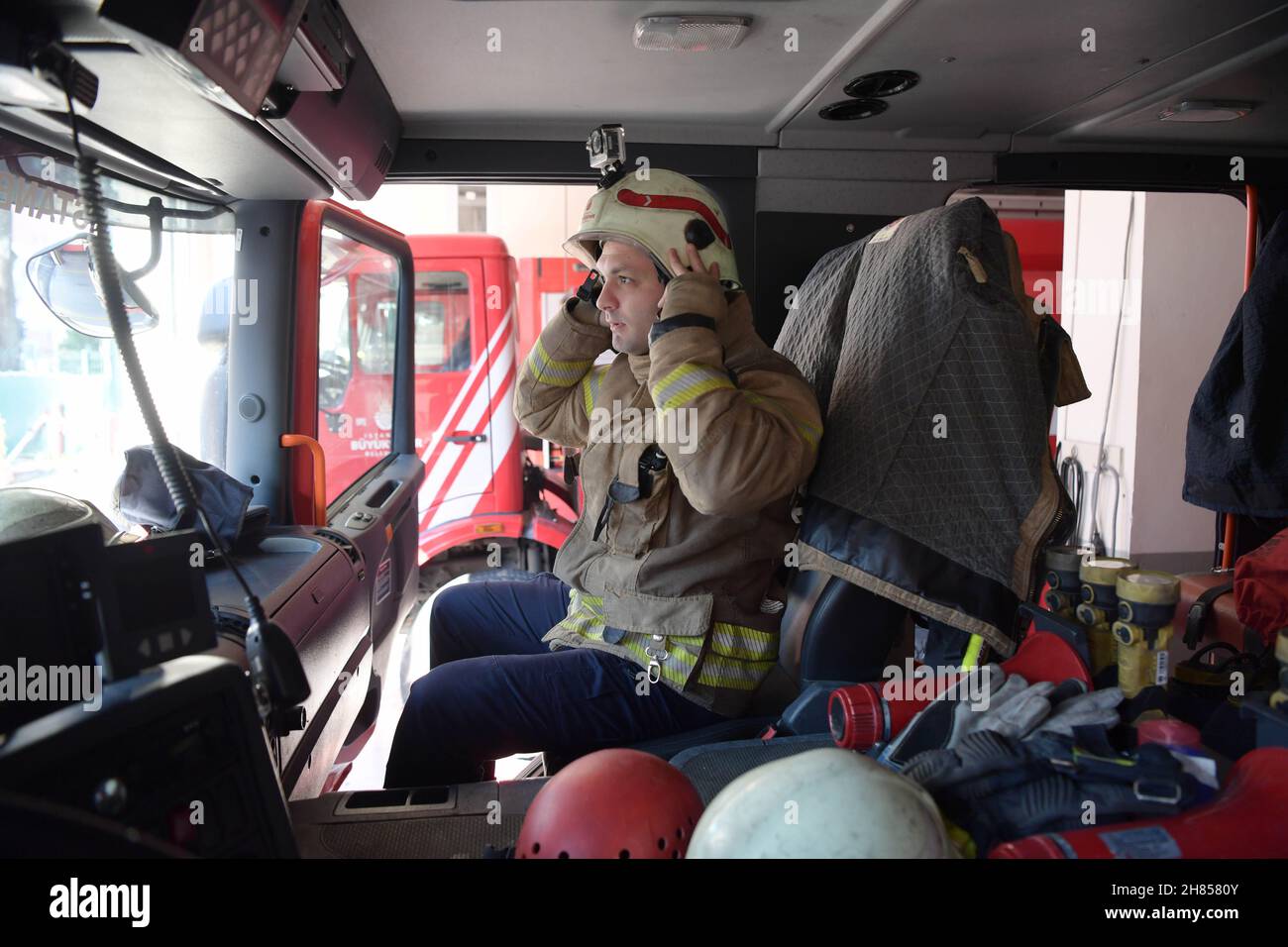 Istanbul, Turkey. 22nd Nov, 2021. A firefighter is seen in a fire truck ...