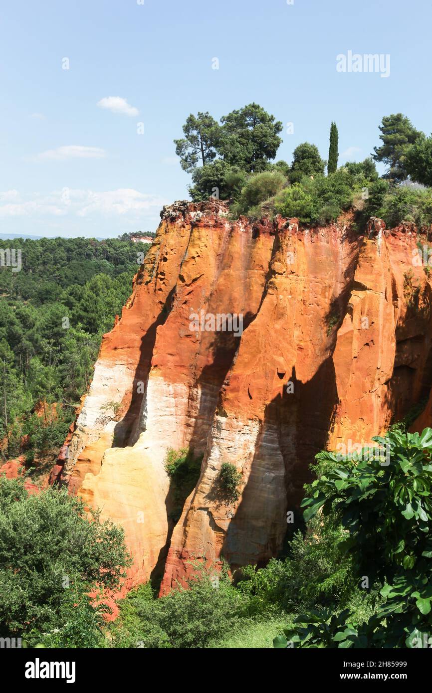 Red ocher cliffs in the village of Roussillon in Provence, France Stock ...