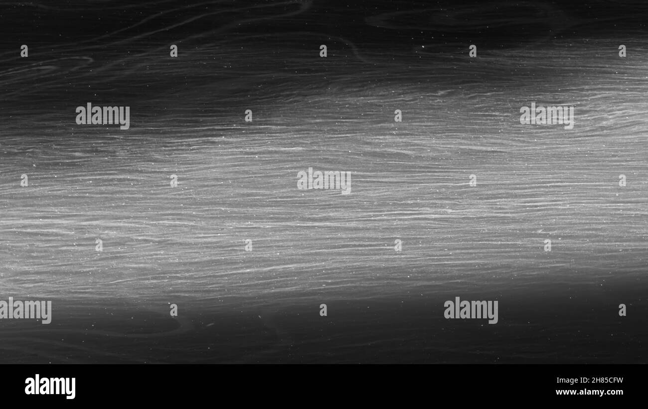 Stream of water in light and shadow Stock Photo - Alamy