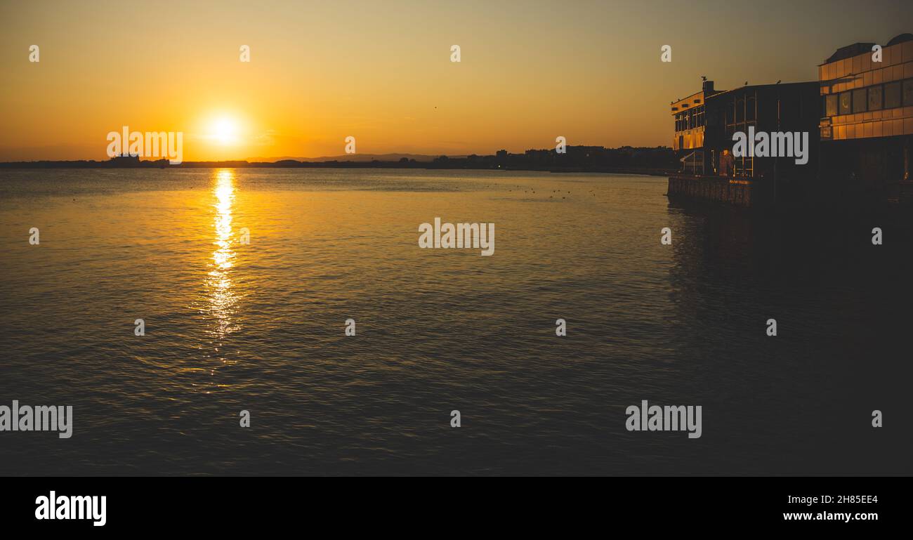 Warm sea sunset landscape. Beautiful sea view. Warm golden hour light ...