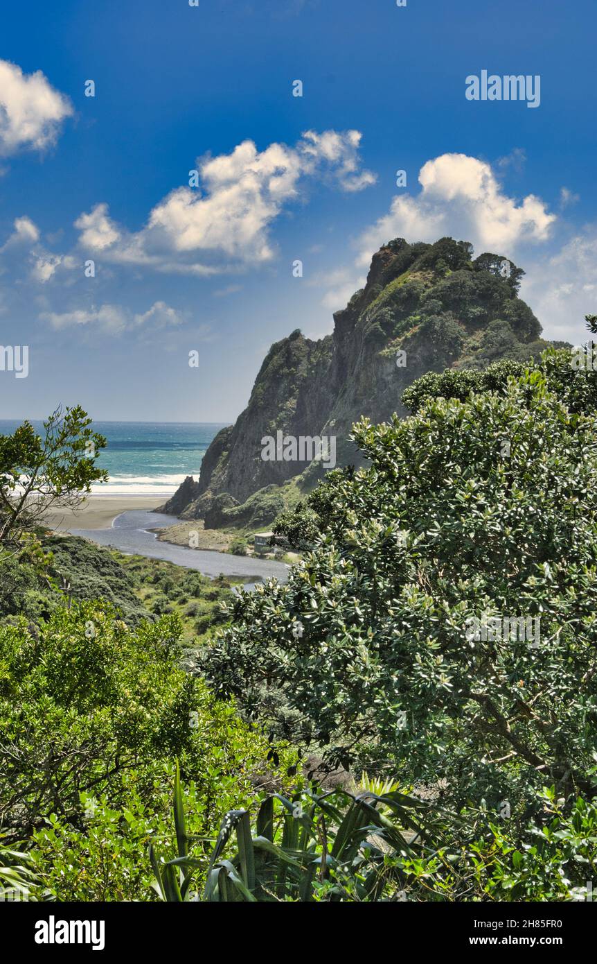 View of The Watchman, a rock formation dominating Karekare Beach in the ...