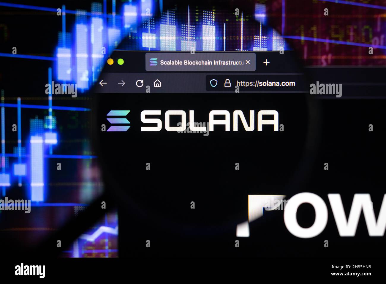 Solana company logo on a website, seen on a computer screen through a ...