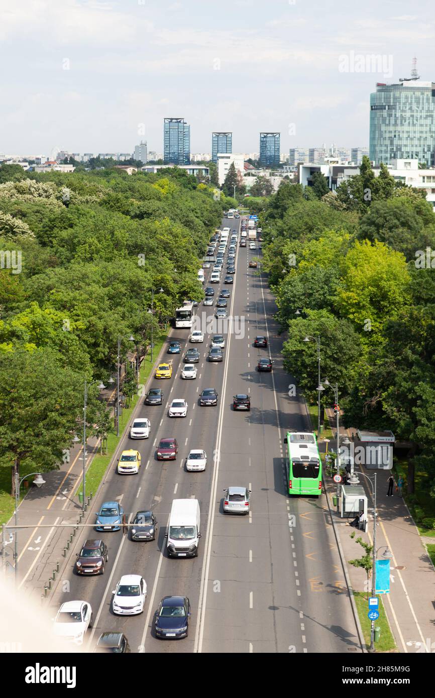 Panoramic view of busy boulevard seeing from building tower observation ...