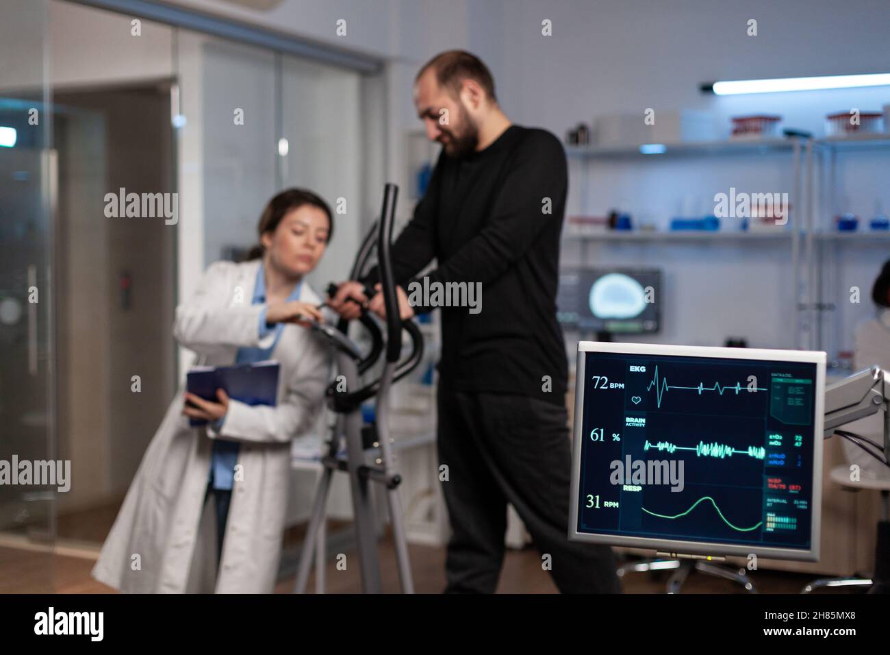Specialist researcher doctor discussing with sportman in gym training ...