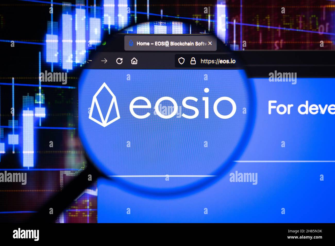 Eosio company logo on a website, seen on a computer screen through a ...