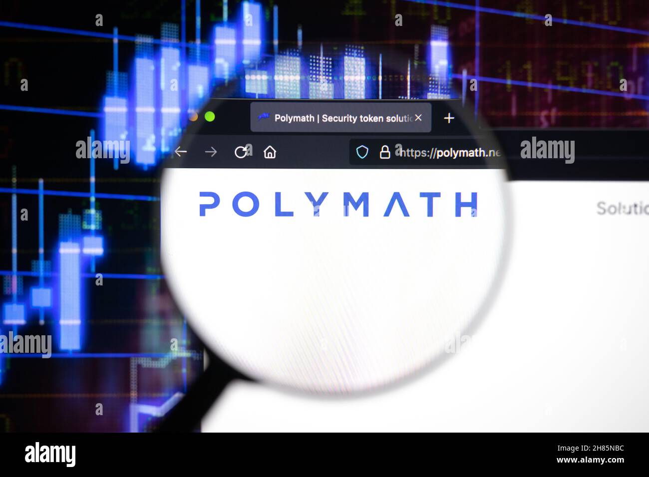 Polymath company logo on a website, seen on a computer screen through a ...