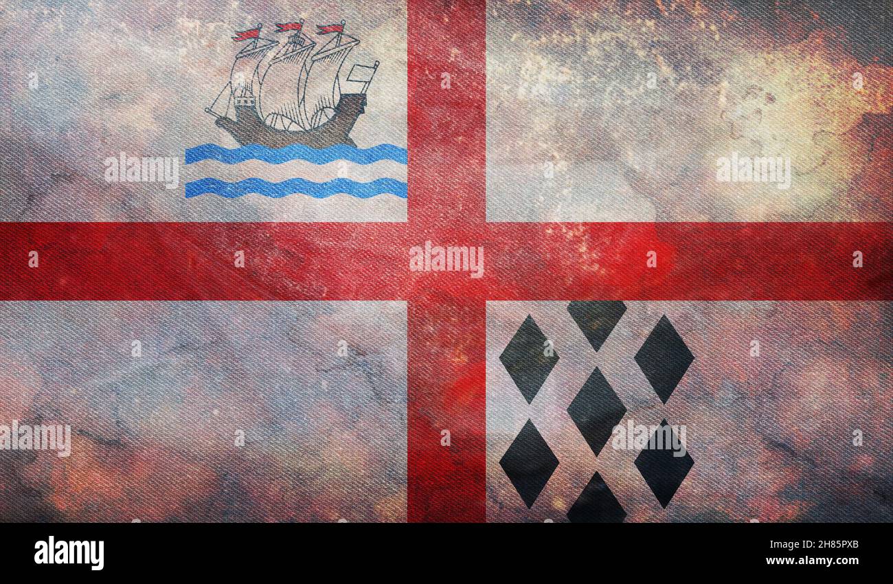 Top view of retro flag of Nanaimo, Canada with grunge texture. Canadian ...