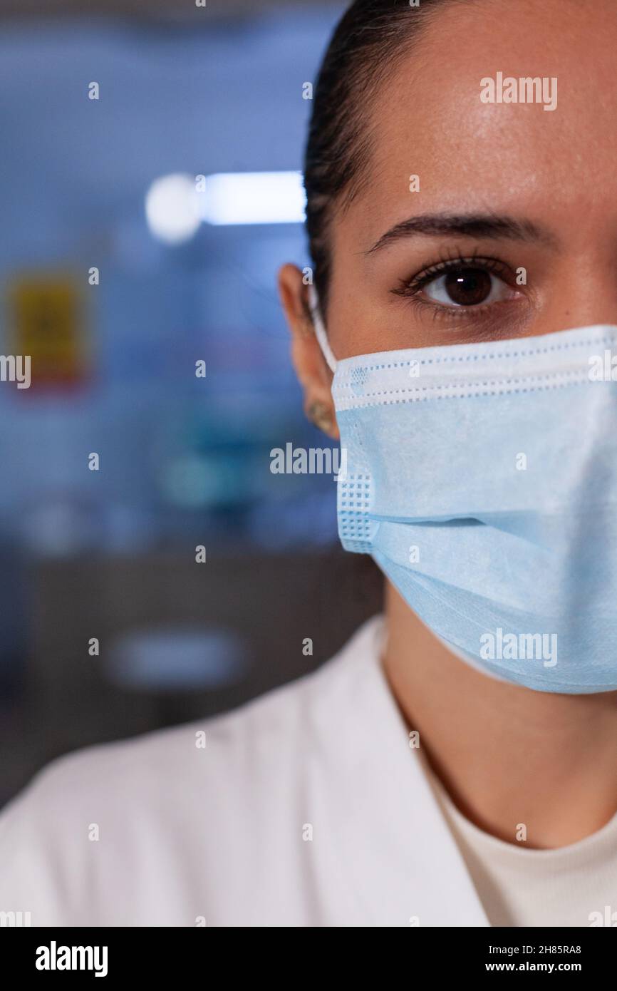Portrait of scientist researcher eye looking into camera during ...