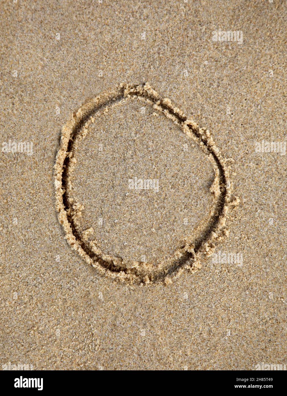 Zero written in the sand at the beach Stock Photo - Alamy