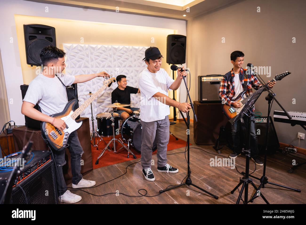 band recording in studio with sound instruments and equipment Stock ...