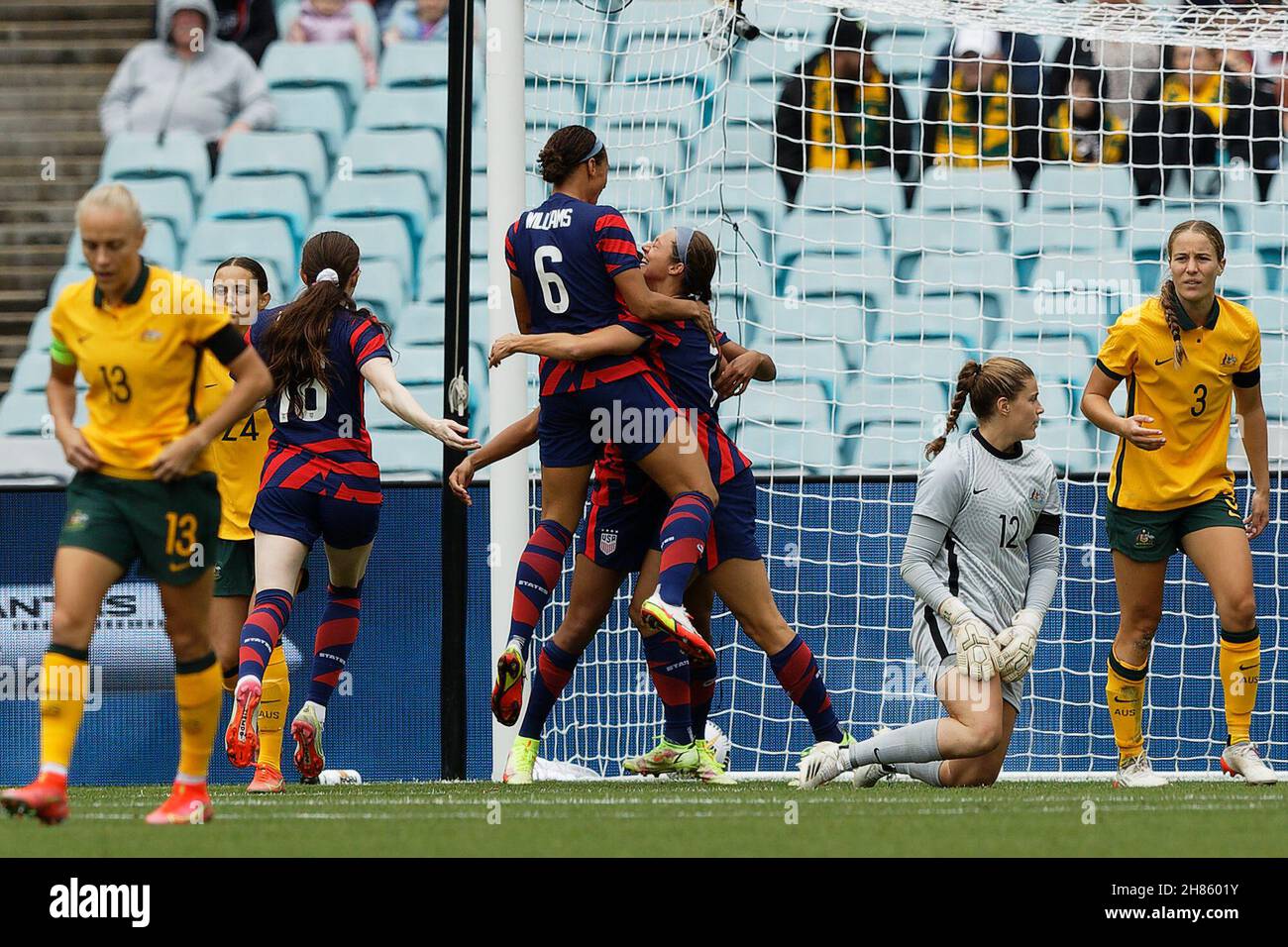 Ashley Hatch of the United States is celebrating with her team mates ...