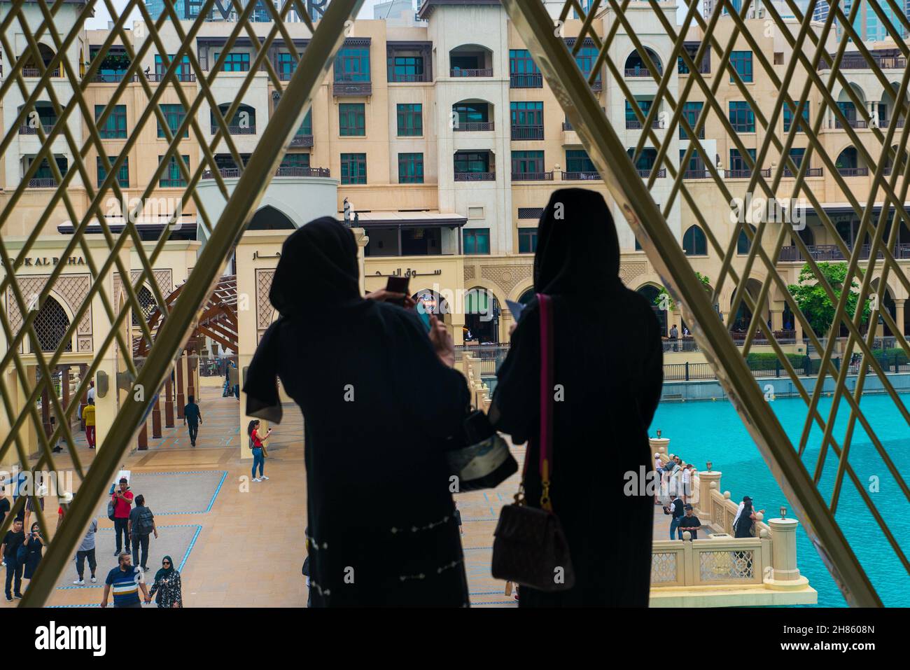 DUBAI, UNITED ARAB EMIRATES - Oct 29, 2021: A back view of two Hijabi ...