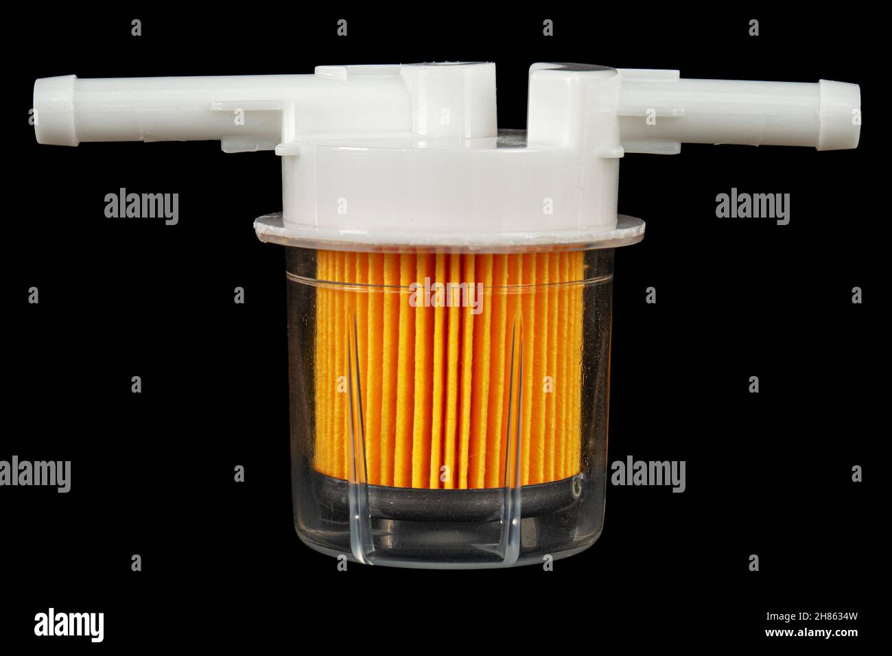Car fuel filter, isolated on black background Stock Photo - Alamy
