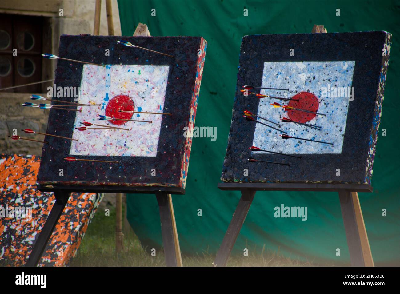 Many medieval arrows hit the target Stock Photo - Alamy