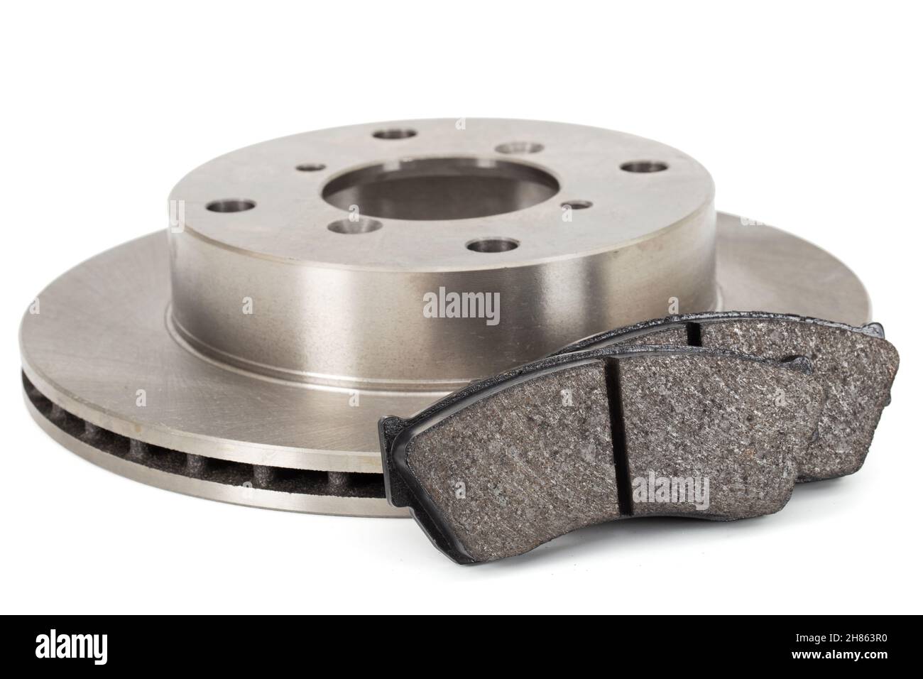 Ventilated car brake disc and pads, isolated on white background ...