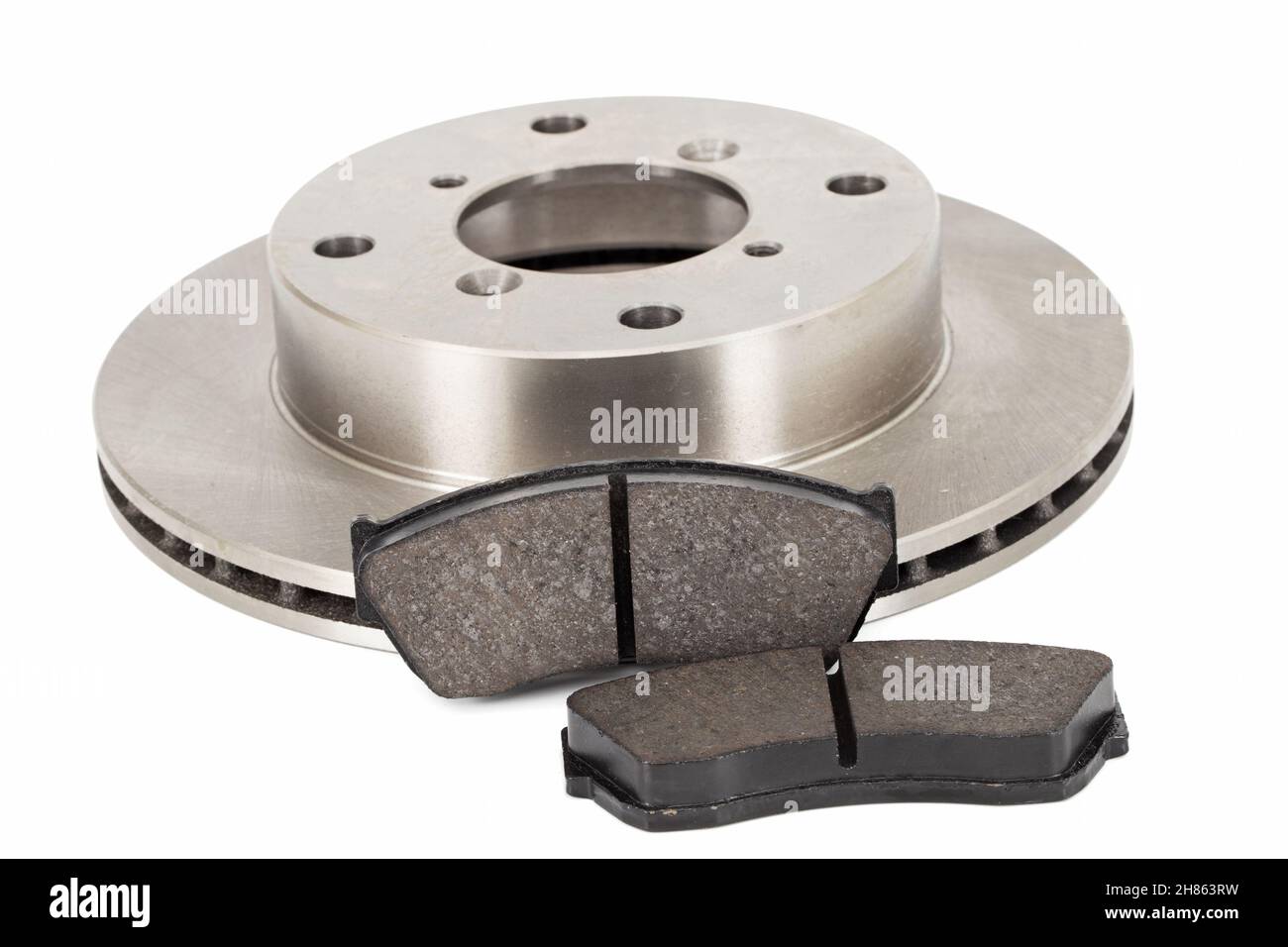 Ventilated car brake disc and pads, isolated on white background ...