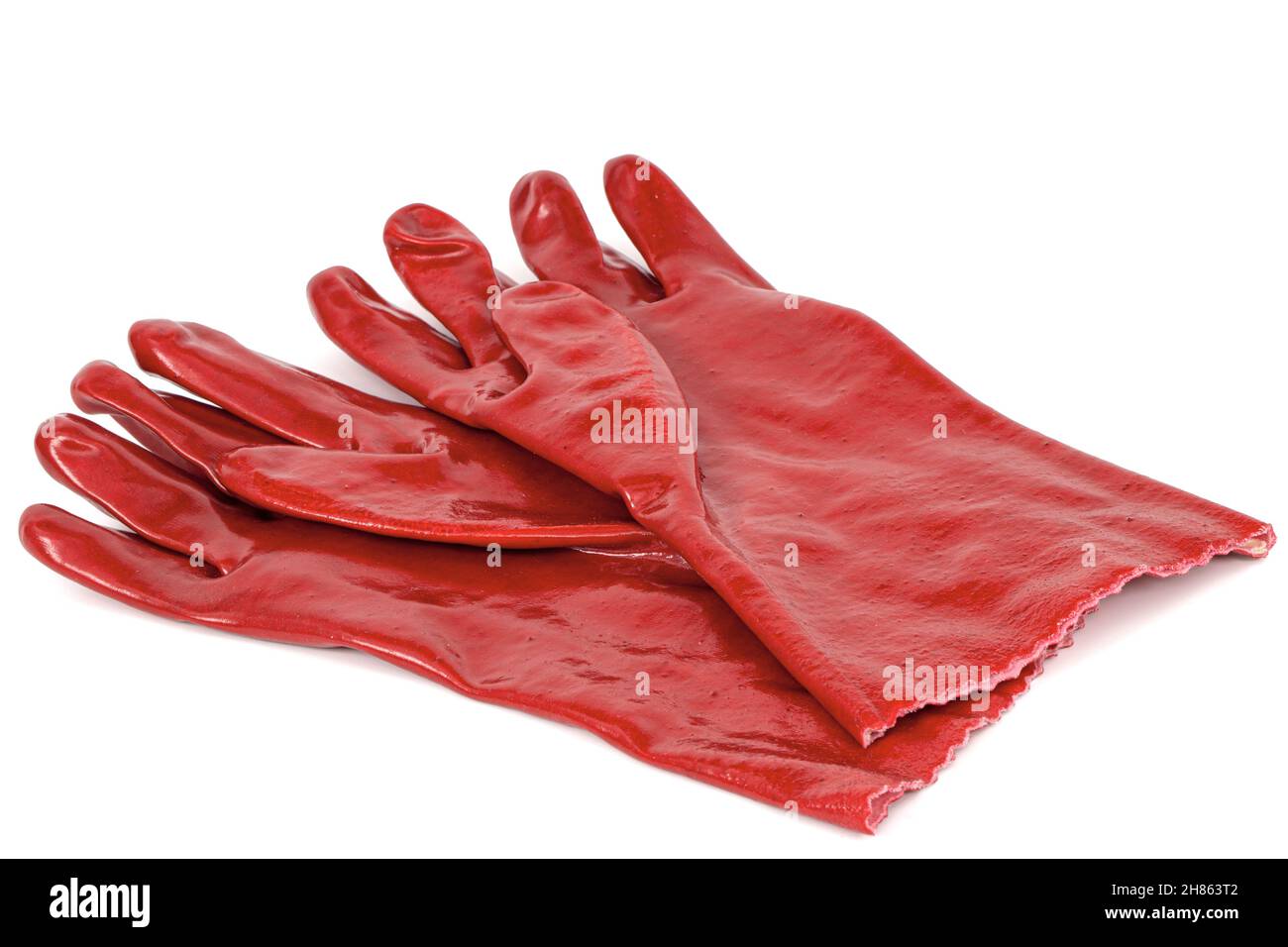 Pair of the red rubber gloves, isolated on white background Stock Photo ...