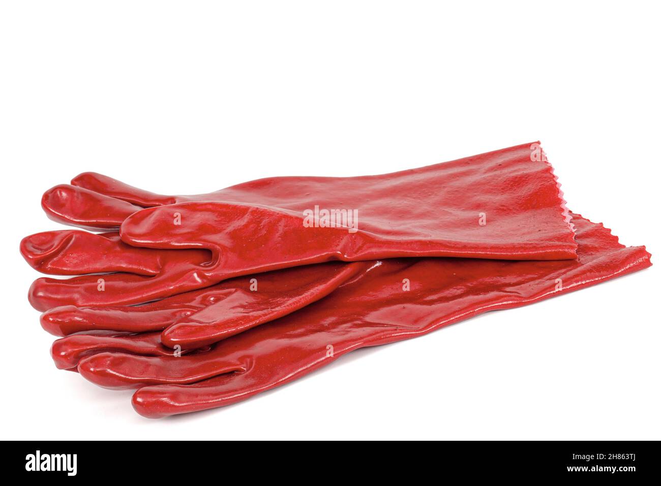 Pair of the red rubber gloves, isolated on white background Stock Photo ...