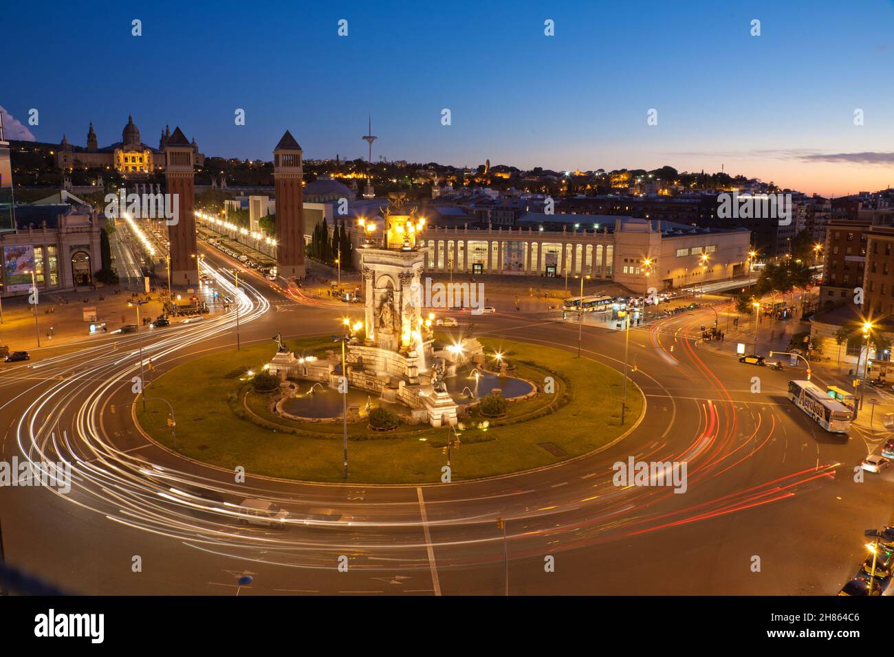 An aerial long exposure shot of the center of Barcelona, Spain at night ...