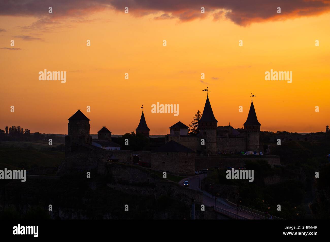 Silhouette of an old medieval castle during sunset Stock Photo - Alamy