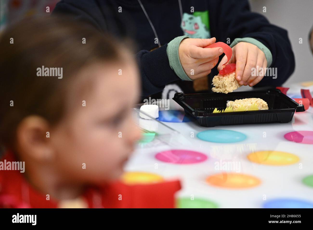 A child makes candy sushi at Cricket’s Candy Creations in New York, NY ...
