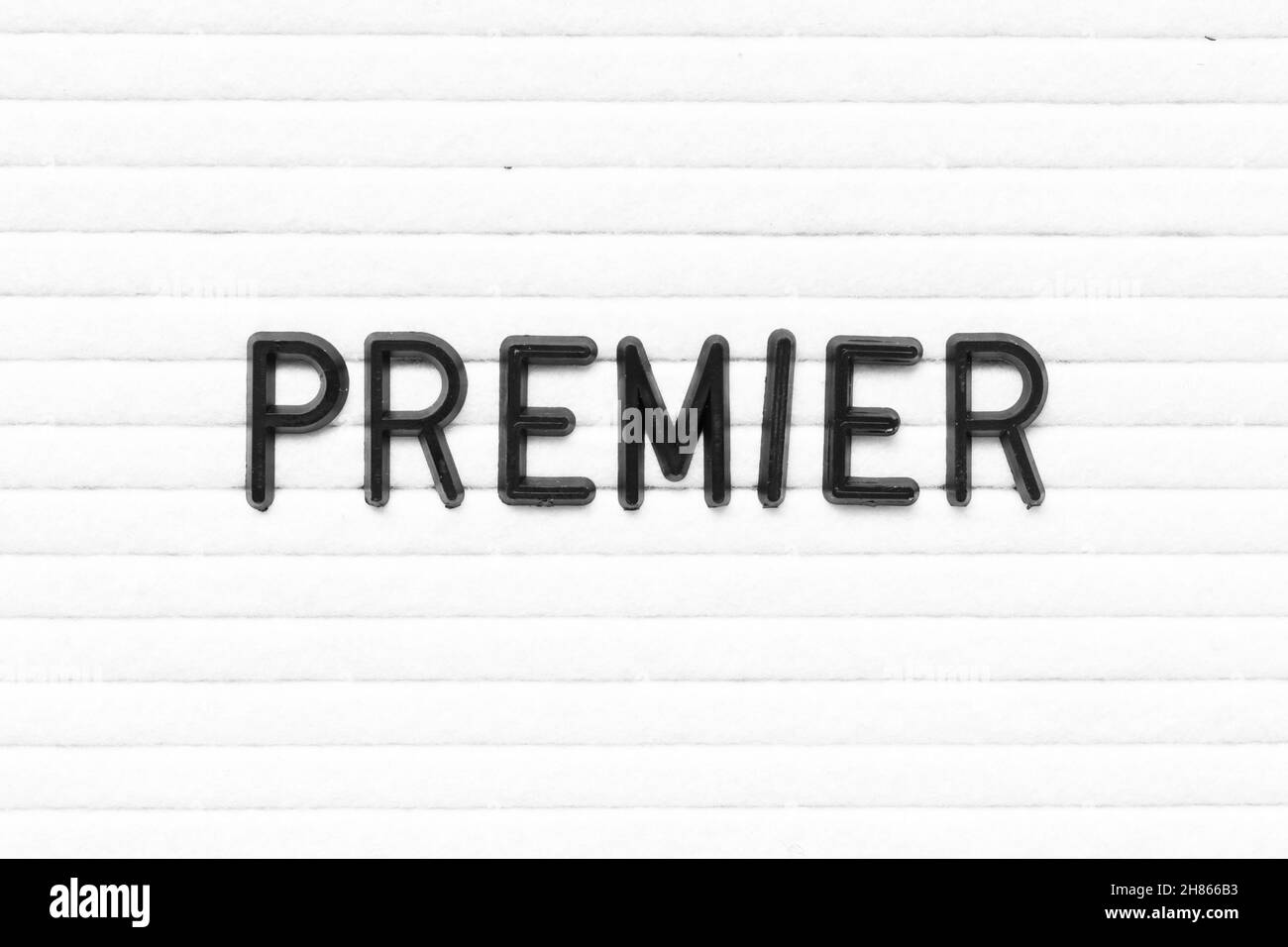 Black letter in word premier on white felt board background Stock Photo ...