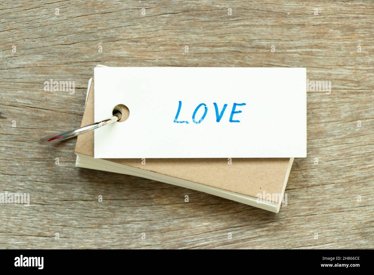Flash card with handwriting word love on wood background Stock Photo ...