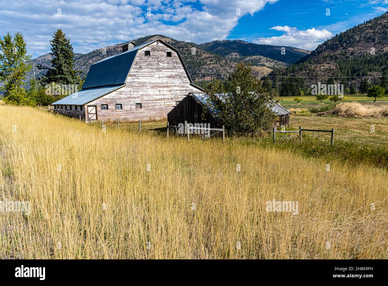 Gray Wooden Barn Surrounded By Mountains, Paradise, Montana, USA Stock ...