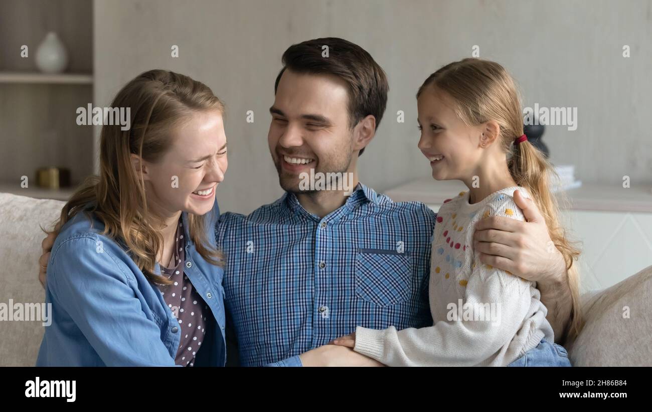 Father mother child talking sofa hi-res stock photography and images ...