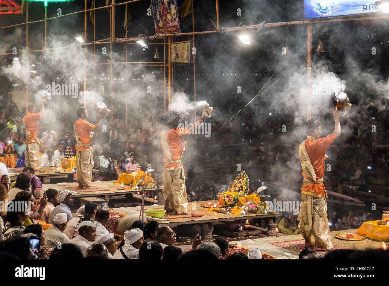 Indian men perform ceremony in varanasi hi-res stock photography and ...