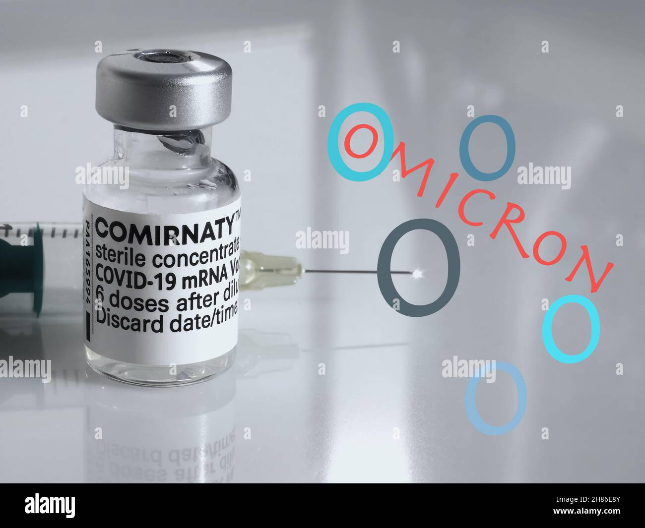 Omicron symbol with Biontech Fizer Vaccine Stock Photo - Alamy