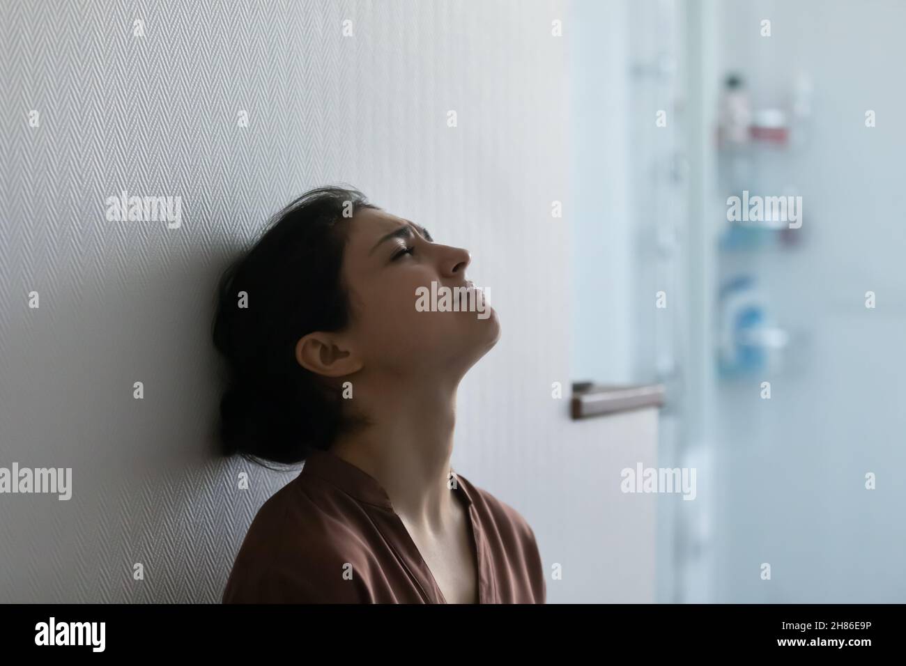 Stressed young indian woman suffering from depression Stock Photo - Alamy
