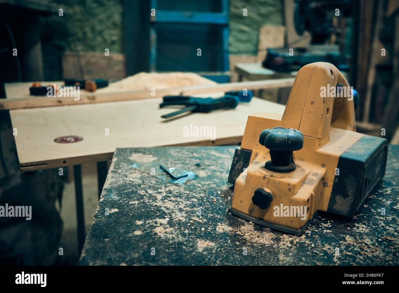 Carpenter plane at workbench Stock Photo - Alamy