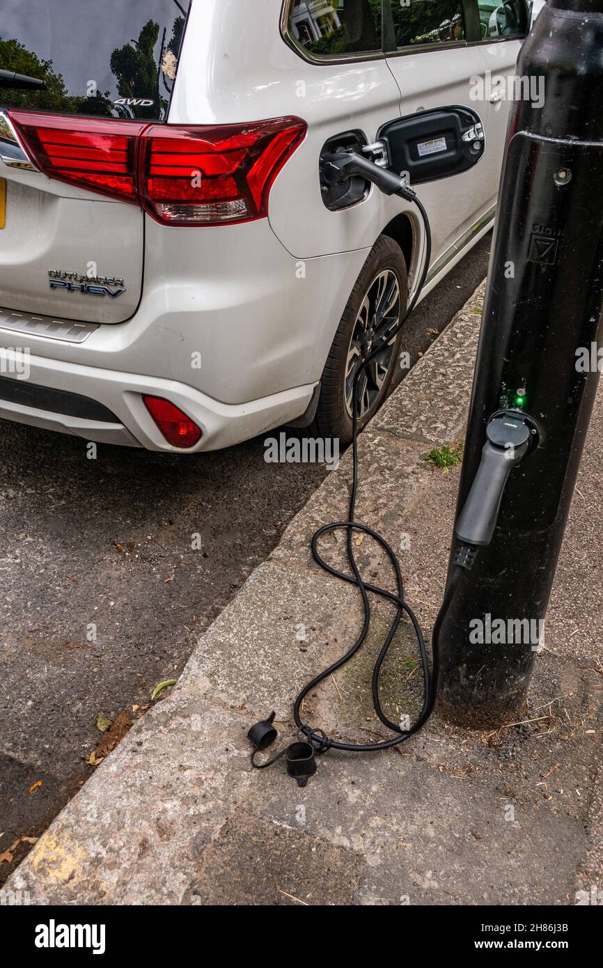 Simple Socket car charging point in London Street Stock Photo - Alamy