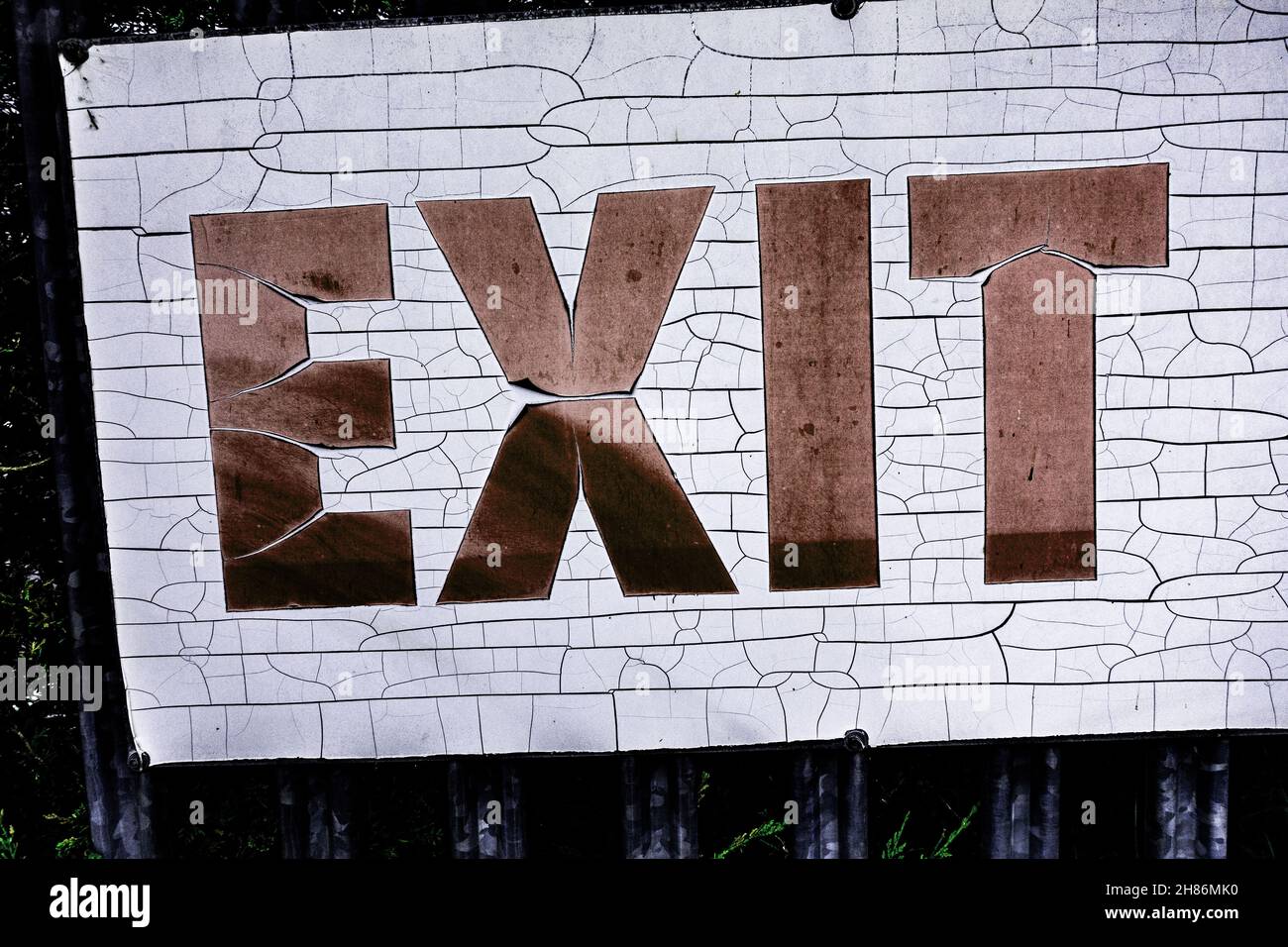 exit sign mounted on security railings Stock Photo - Alamy