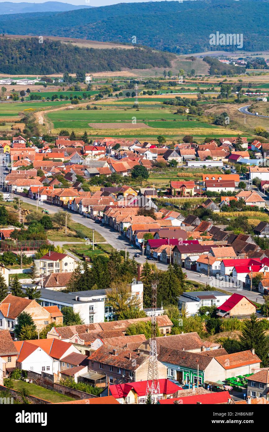 Aerial view of the town center with hills, buildings, streets ...