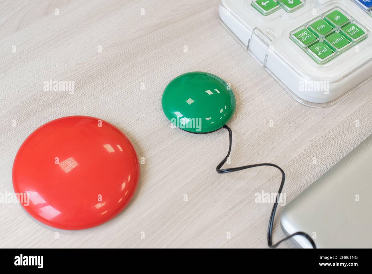 Woman with cerebral palsy working on a specialized wireless computer ...