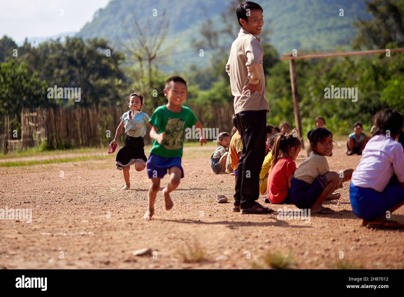 Luang Prabang. Laos. 18th Nov, 2014. Students play "Duck, duck, goose ...