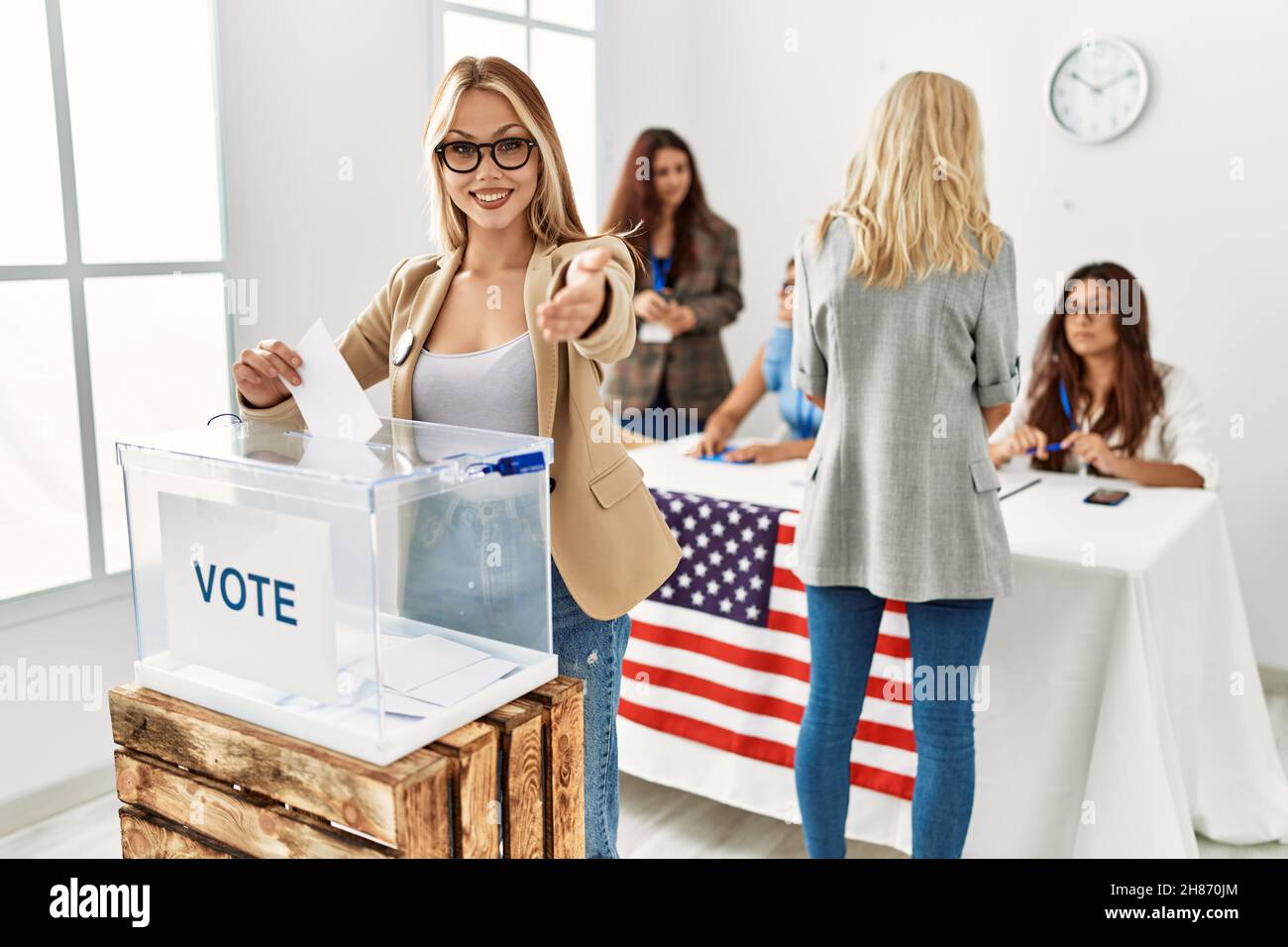 Group of young girls voting at democracy referendum smiling friendly ...