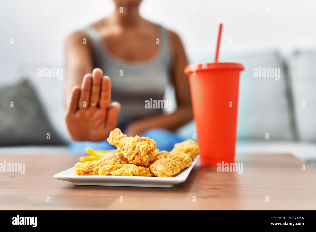 Young hispanic woman rejecting hi-res stock photography and images - Alamy