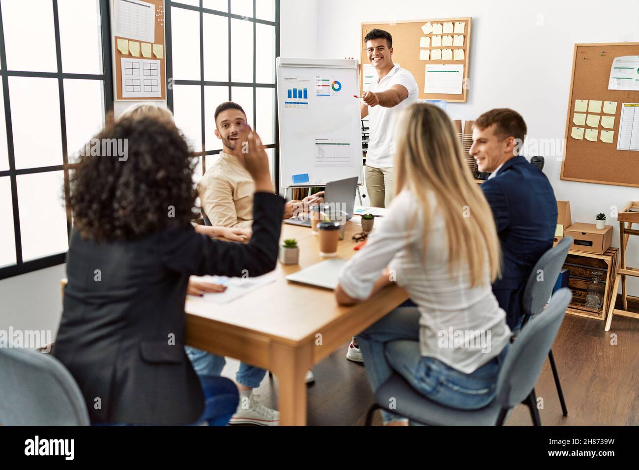 Group of business workers listening boss conference during meeting at ...