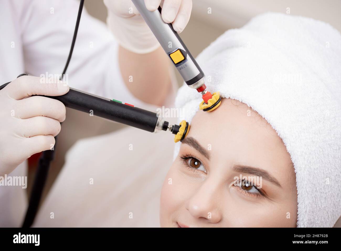 Closeup microcurrent procedure for lifting skin face treatment young ...