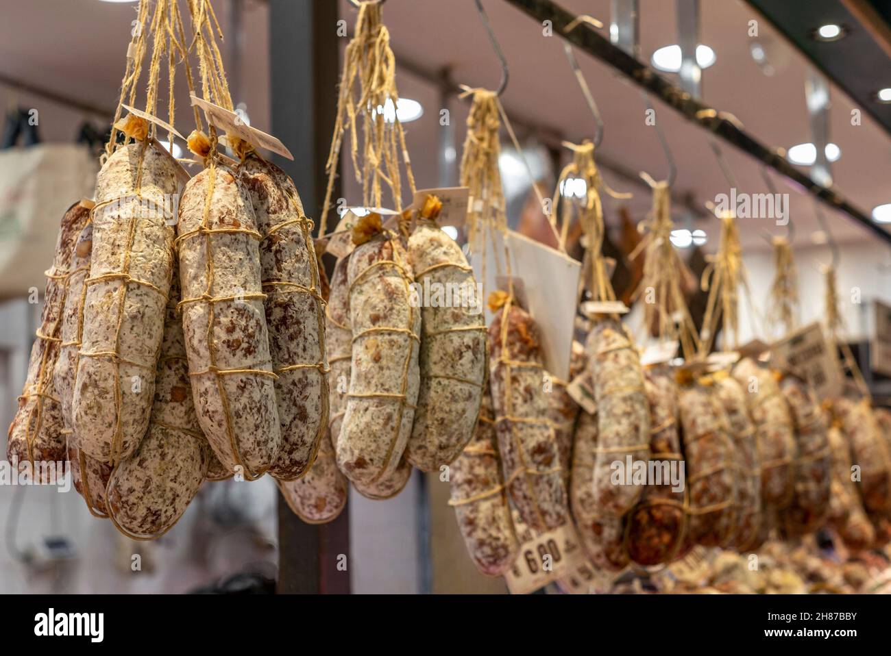 Tuscan salami hanging in a butcher shop in Florence Stock Photo - Alamy