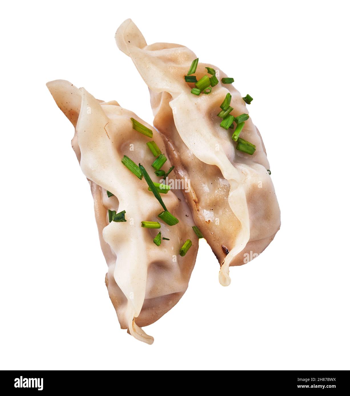 Two chinese gyoza isolated on a white background Stock Photo - Alamy