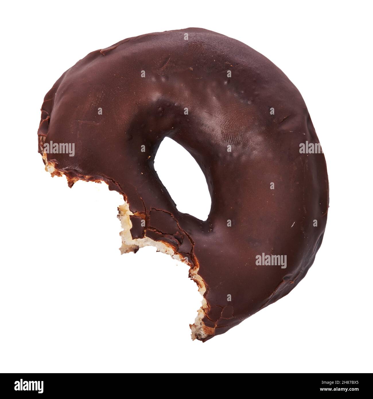 Single bitten chocolate doughnut isolated on a white background Stock ...