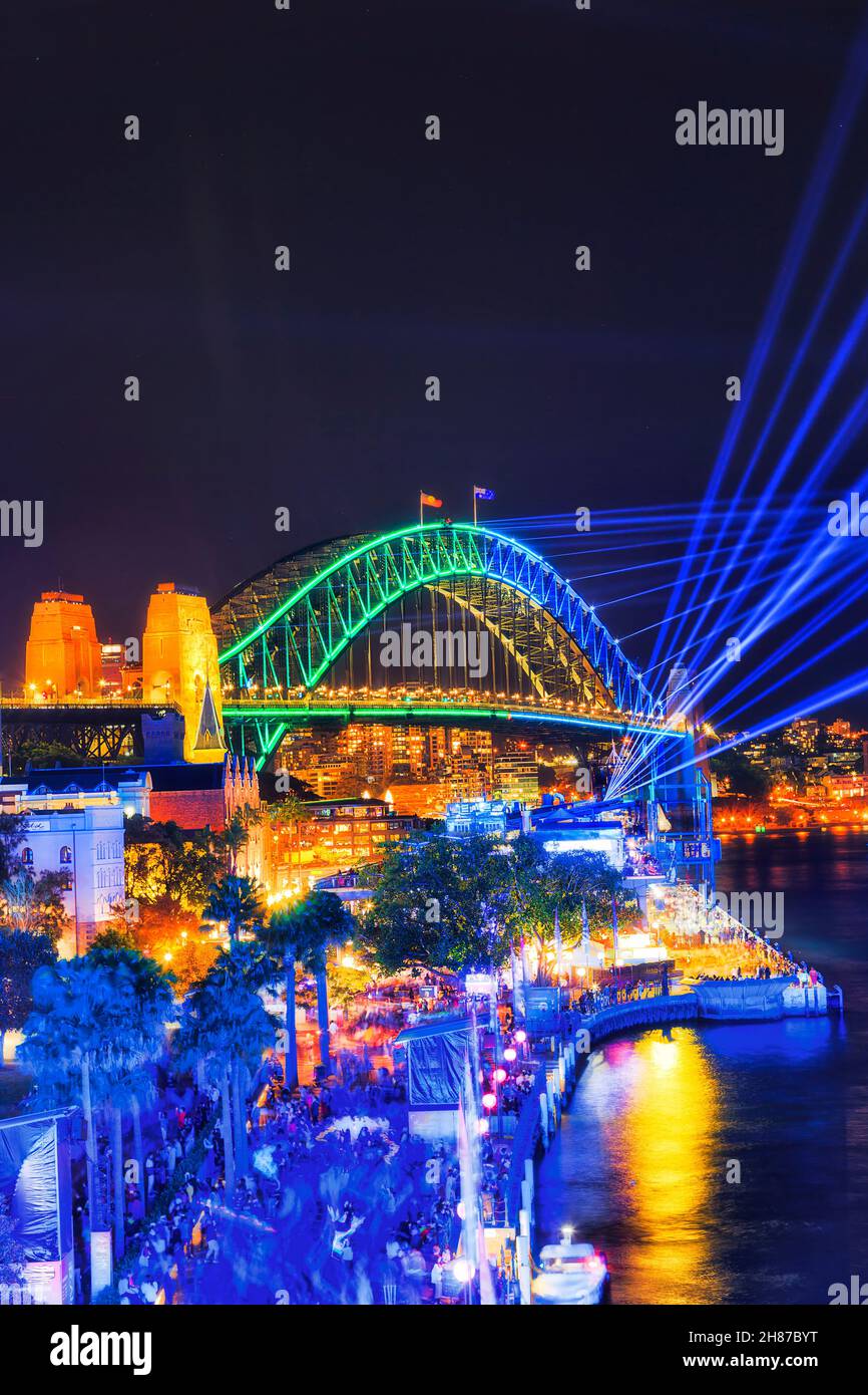 Illuminated arch of Sydney Harbour bridge off Circular quay in Sydney ...