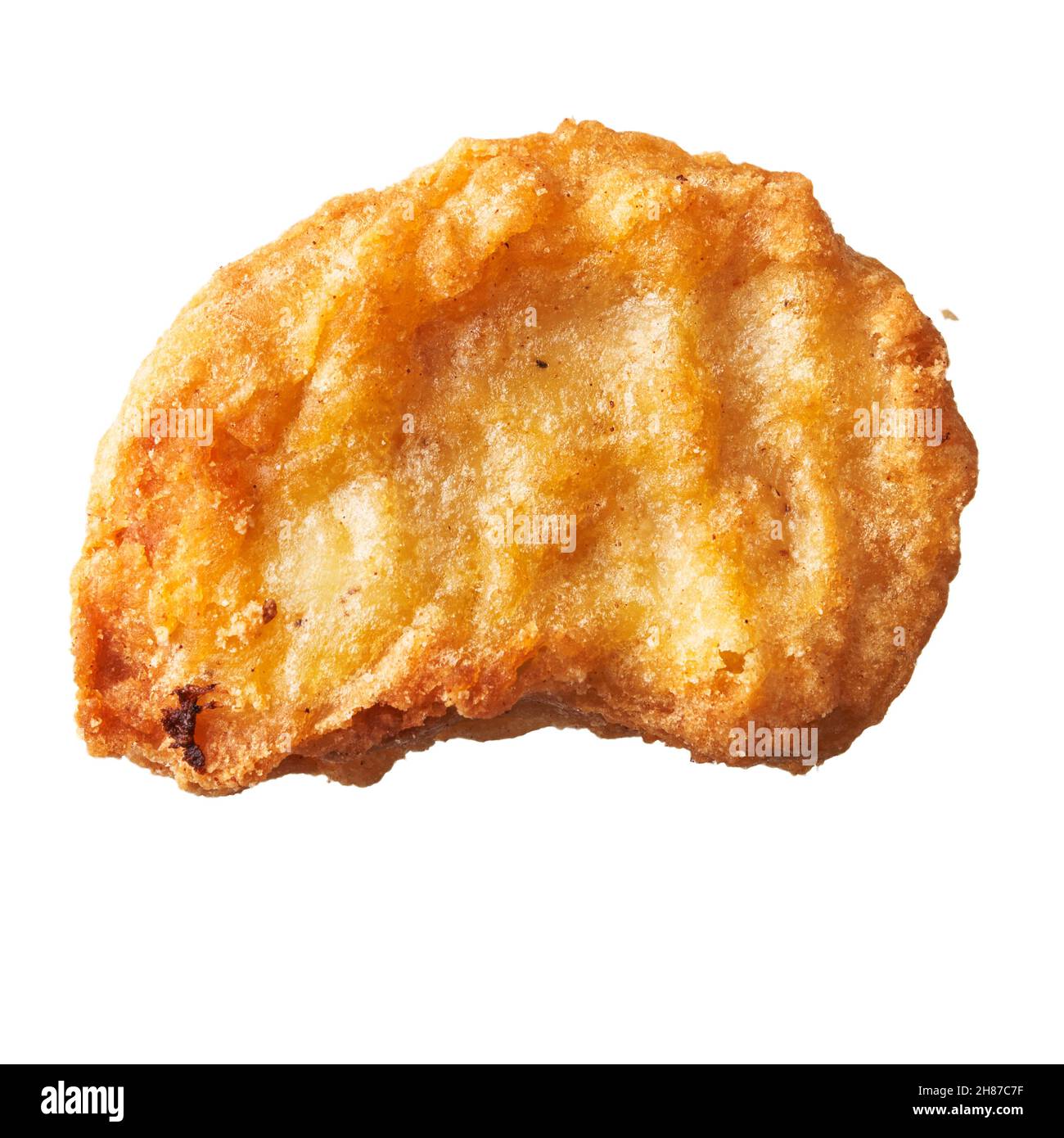 SIngle chicken nugget isolated on a white background Stock Photo - Alamy