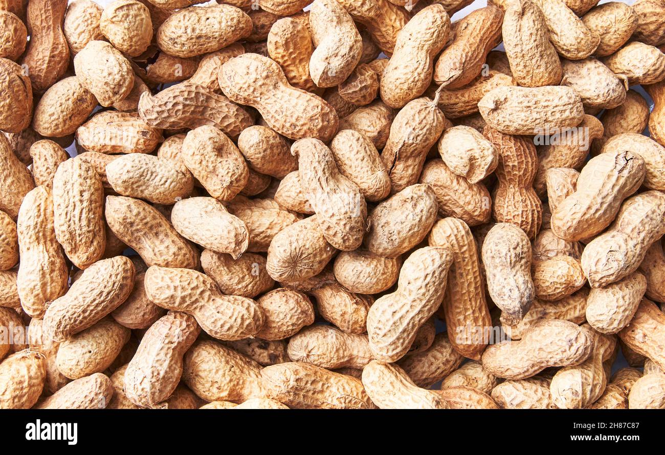 Bunch of peanuts with shell texture Stock Photo - Alamy