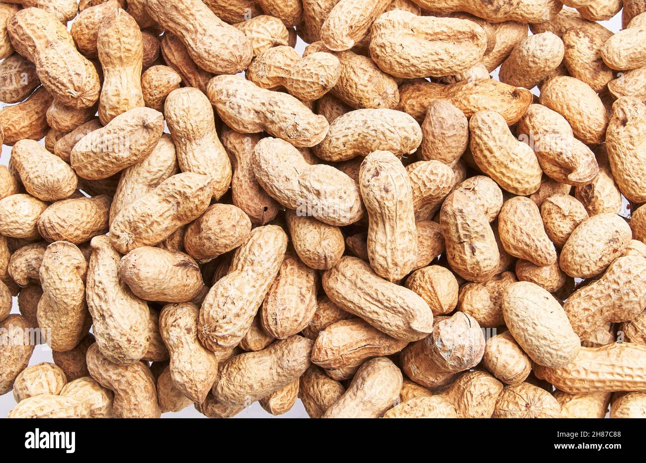 Bunch of peanuts with shell texture Stock Photo - Alamy